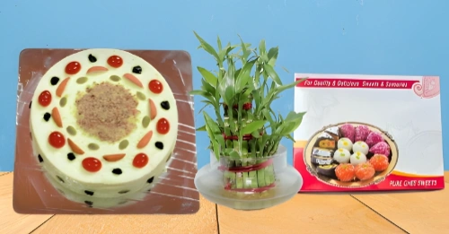 Traditional Nepali Kurauni Cake with Lucky Bamboo & Assorted Mithai ...